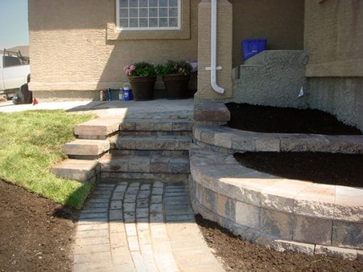 Pisa II retaining wall steps and planters in Antique Brown. Holland ...